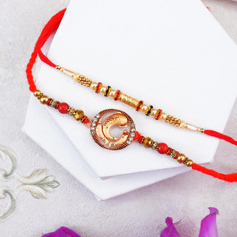 Send Set of Two Golden Rakhi Online - RKH22-104073 | Giftalove